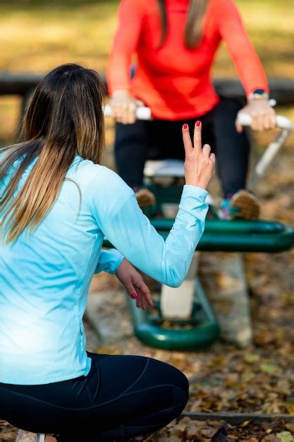 Premium Photo Women Exercising Outdoors In A Public Park