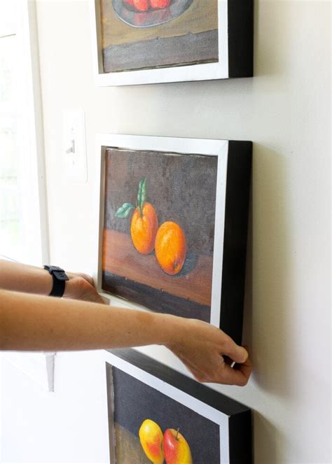 How To Remove Command Strips Without Damaging Your Walls The Homes