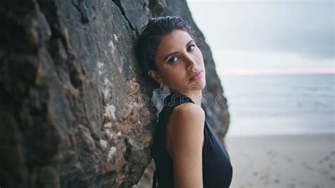 Attractive Girl Leaning Beach Cliffs Closeup Model Posing Sandy