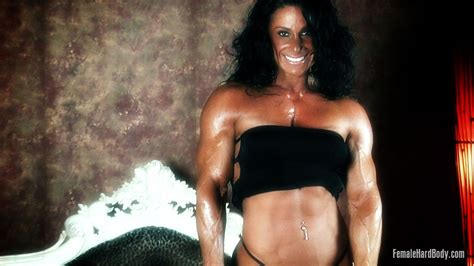 Bodybuilder Debbie Bramwell Shows Her Big Ass While Flexing Her Muscles