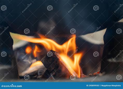 Close Up Photography Capturing The Mesmerizing Flames In Firewood Stock