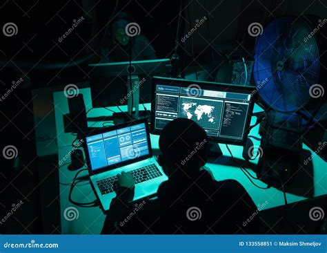 Wanted Hackers Coding Virus Ransomware Using Laptops And Computers In