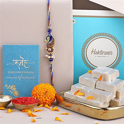 Buysend Sneh Peacock Rakhi With Kaju Katli Online Fnp