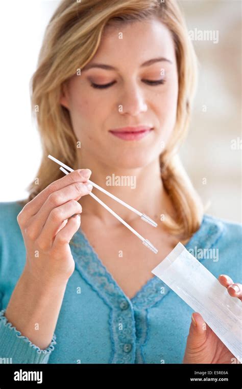 Woman Using DNA Test Stock Photo Alamy