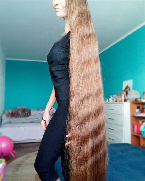 عکس های جالب و دیدنی از مو بلندترین دختر زیبای جهان در کشور روسیه