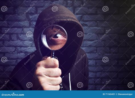 Hooded Computer Hacker With Magnifying Glass Stock Image Image Of Hacker Malware 71165431