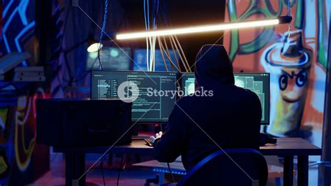 Hacker Leaving Secret Base With Ssd In Briefcase Containing Data