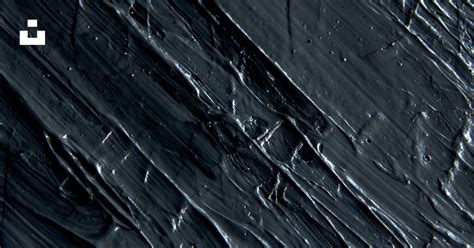 물방울이 있는 검은 표면의 클로즈업 사진 Unsplash의 무료 텍스처 벽 이미지