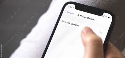 Software Update Screen On Mobile Phone Close Up Automatic Update Button Banner Photo Stock