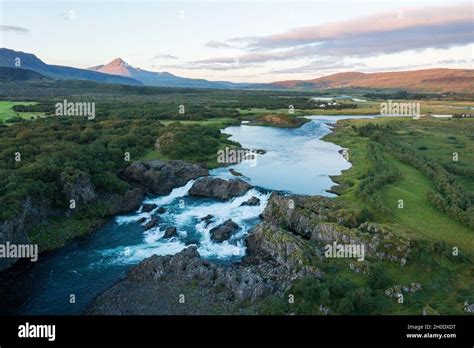 A Beautiful Waterfall In Evening Light In Iceland Glanni Waterfall