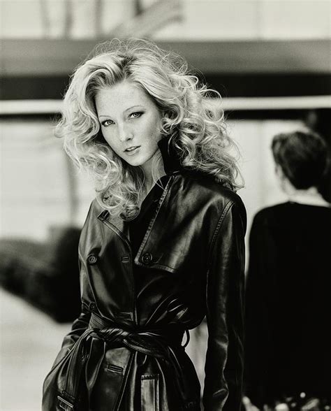 Maggie Rizer Wearing A Leather Trench Coat Photograph By Arthur Elgort
