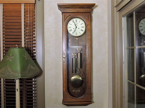 Howard Miller Pendulum Chiming Wall Clock Ebth
