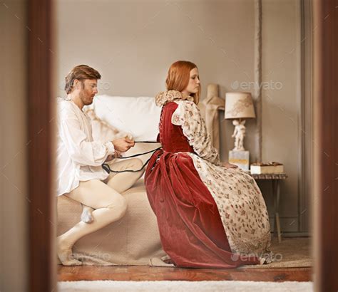 Quite The Quandary This Outfit Shot Of A Noble Man Undressing His Wife