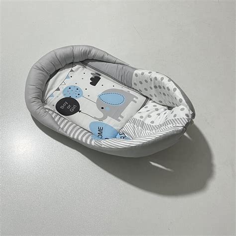 خرید و قیمت آغوشی نوزاد یا قنداق سوئیسی یا تشک سوئیسی طرح فیل و بادکنک پسرانه از غرفه سیسمونی