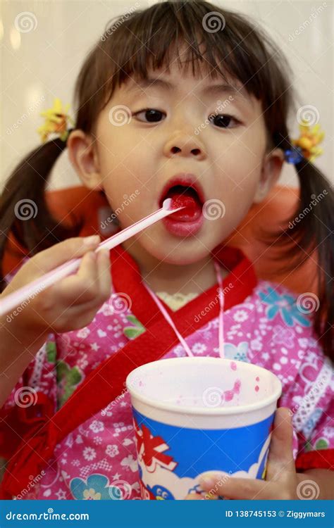 Japanese Girl Eating Shaved Ice In Yukata Stock Image Image Of Dress