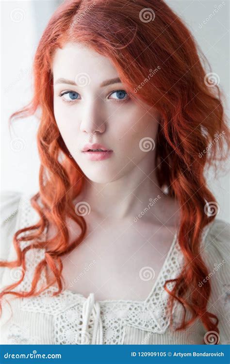 Tender Retro Portrait Of A Young Beautiful Dreamy Redhead Woman Stock