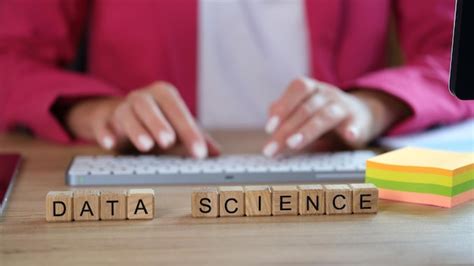 Premium Photo Words Data Science On Wooden Cubes And Female Scientist