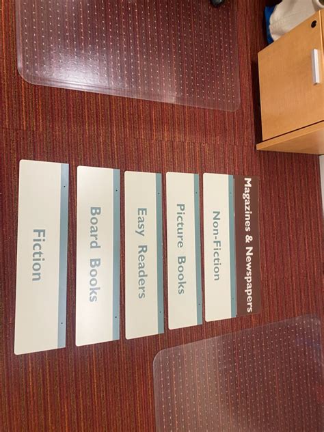 signs reaching across illinois library system