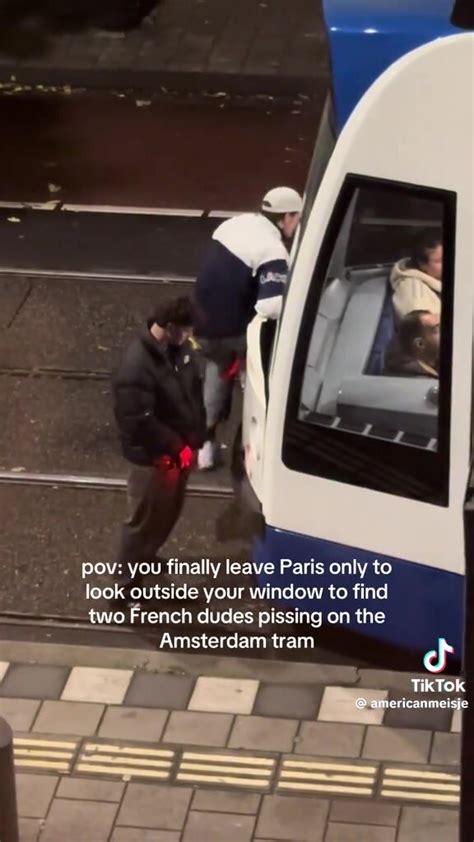 Guy Pissing Against Tram