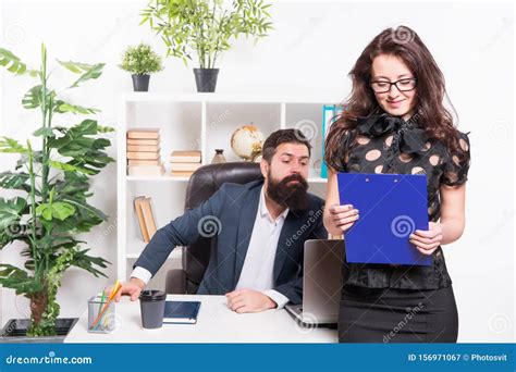 Charming Nerd Female Employee With Nerd Look Standing In Front Of Employer Stock Image Image