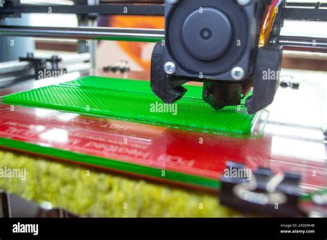 3d Printer Close Up A Working 3d Printer In Process Of Printing Object