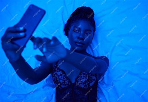 Premium Photo Sexy Selfie Bed And Black Woman With Lighting For A