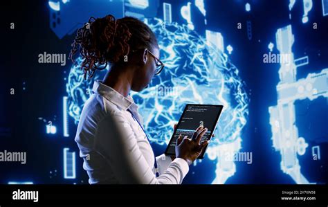 Seasoned It Contractor Programming Scripts On Tablet Employing Ai Machine Learning Proficient