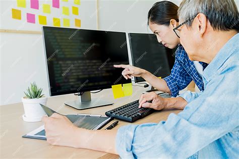 Premium Photo Programmer Working In A Software Development And Coding Technologies Website