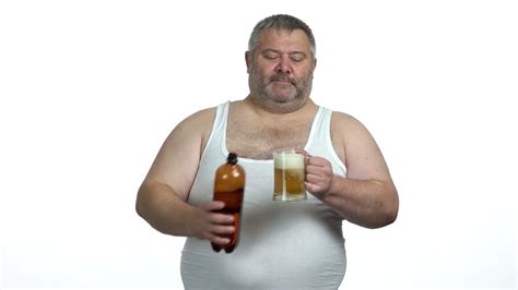 Fat Man Pours Beer From Bottle Into Beer Stock Footage Sbv Storyblocks