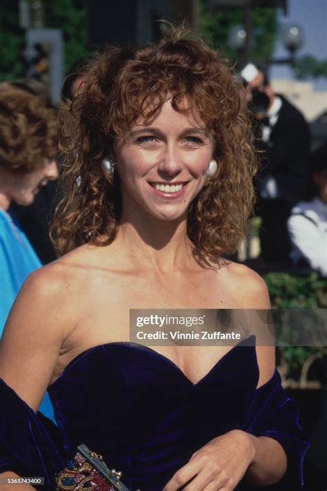 American Actress And Singer Michele Greene Wearing A Blue Velvet