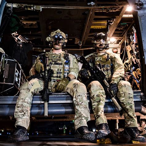 U S Air Force Pararescuemen Chilling In A Helicopter During A Night In