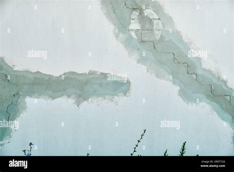 Concrete Wall With Crack Running Down Repaired With Gray Concrete Patching Putty With Green