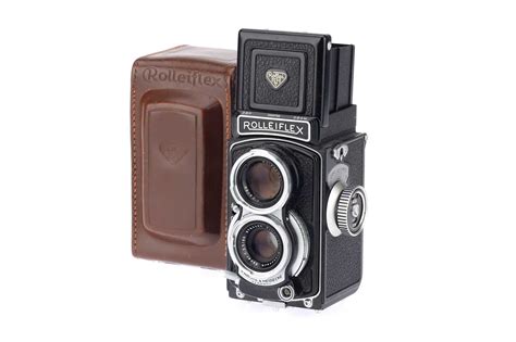 Lot 304 - A Rollei Baby 4x4 Rolleiflex Model K5 Black