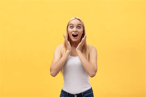 Premium Photo Portrait Of A Young Woman Against Yellow Background