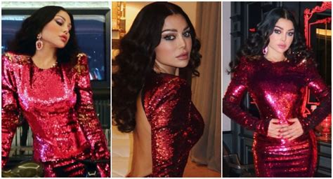 شرطةالموضة هيفاء وهبي تحتفل بالكريسماس بفستان أحمر لامع مكشوف الضهر