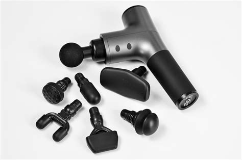 Premium Photo Massage Gun In A Case Handheld Cordless Professional Percussion Deep Tissue Body