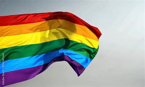 Rainbow Flag Waving Proudly A Vibrant Rainbow Flag Symbol Of Lgbtq