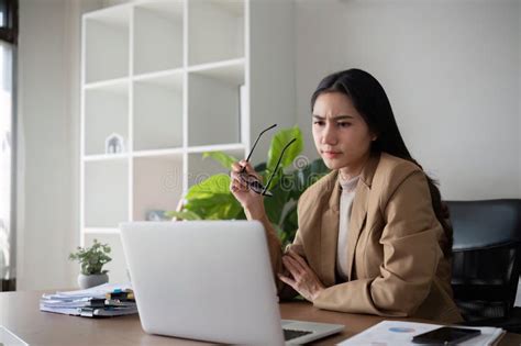 Unhappy Asian Business Woman Shows Stress Over Unsuccessful Business