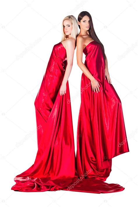 Two Women In Red Dress Standing Back To Back Stock Photo By Alexannabuts