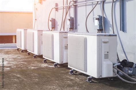 Air Condition Outdoor Unit Compressor Install Outside The Building Stock Photo Adobe Stock
