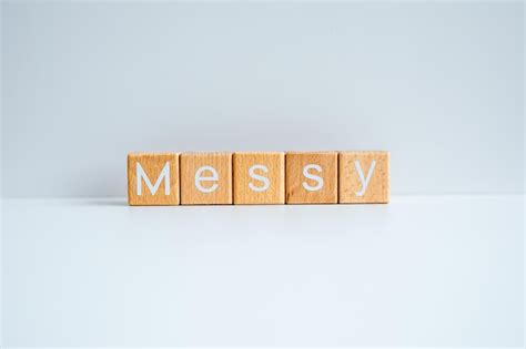 Premium Photo Wooden Blocks Form The Text Messy Against A White