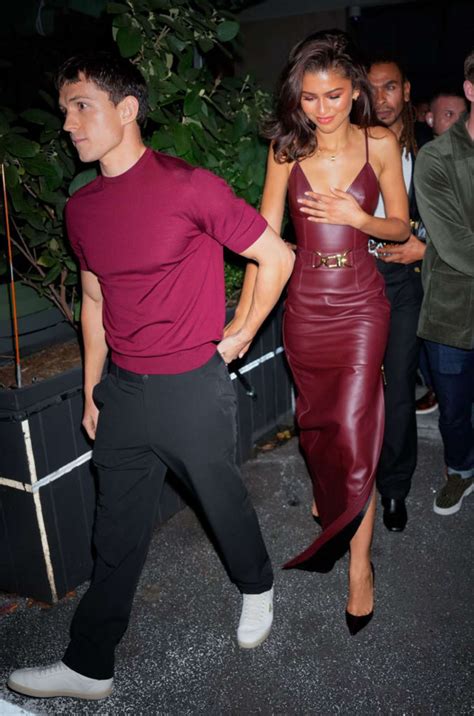 Tom Holland Saves Girlfriend Zendaya From Swarm Of Paparazzi Proving He
