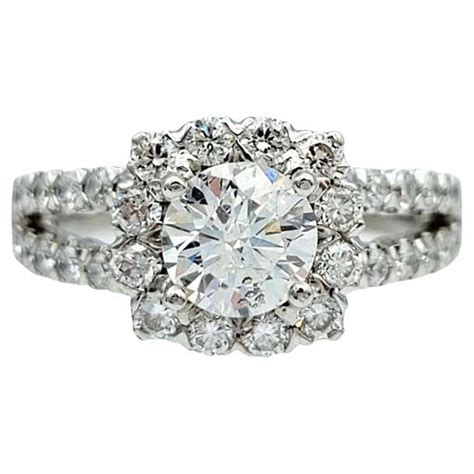 Round Cut Diamond Halo And Split Shank Engagement Ring In 14 Karat