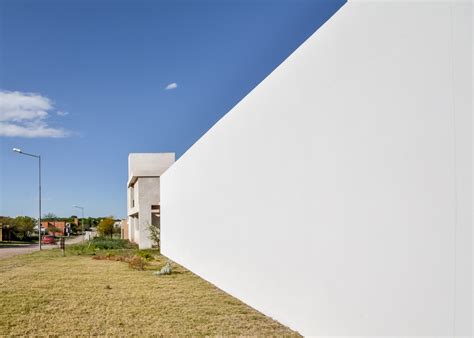 Glass Walls And Terraces Frame Views From House In Argentina