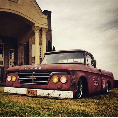 Dodge D100 Sweepsides Pickup With Custom Door Graphics