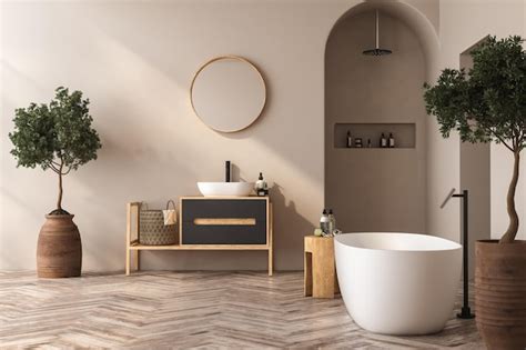 베이지색 벽이 있는 현대적인 욕실의 내부에는 나무 바닥 욕조 식물이 나무 세면대 위에 서 있는 흰색 세면대와 3d 렌더링 위에 매달려 있는 타원형 거울이 있습니다