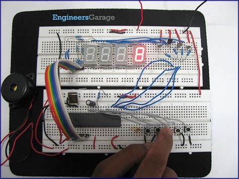 Alarm Clock Using 7 Segment Display And 8051 Microcontroller At89c51