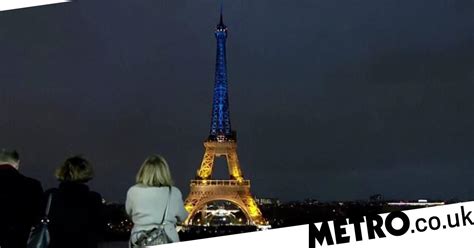 Watch Eiffel Tower Shines Blue And Yellow On Eve Of Ukraine War Anniversary Metro Video