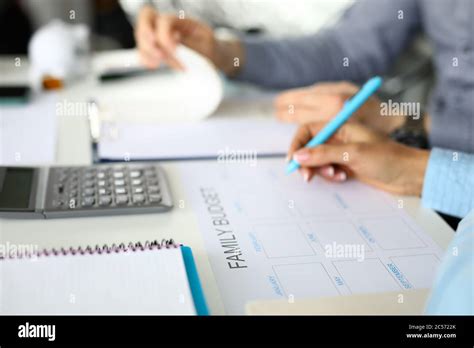Man And Woman Calculating Money Stock Photo Alamy