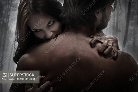 Woman Vampire Bite Superstock